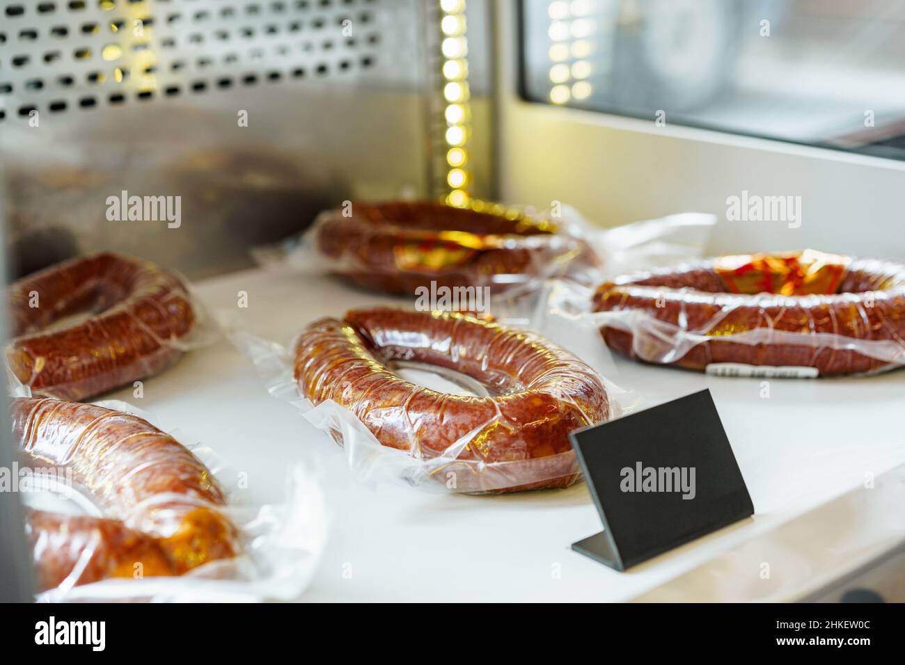 Fresh meat sausages stall at the food shop Stock Photo - Alamy