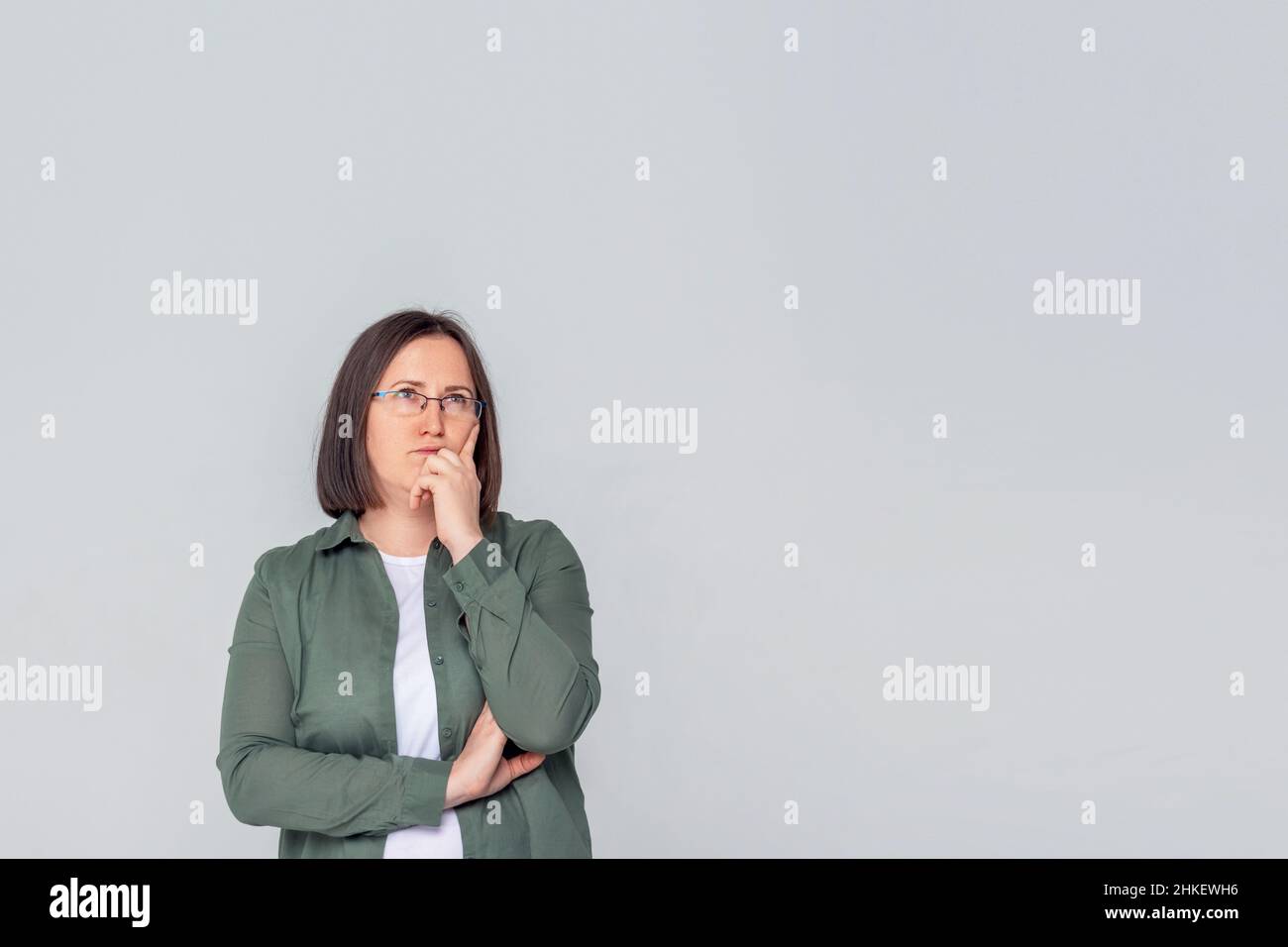 Small business owner woman on grey background Stock Photo - Alamy