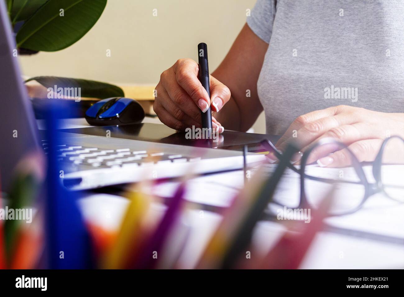 Woman using modern graphics hi-res stock photography and images - Alamy