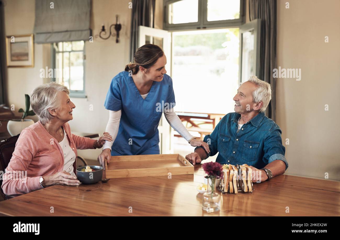 Breakfast served with a big smile, that's five star service Stock Photo ...
