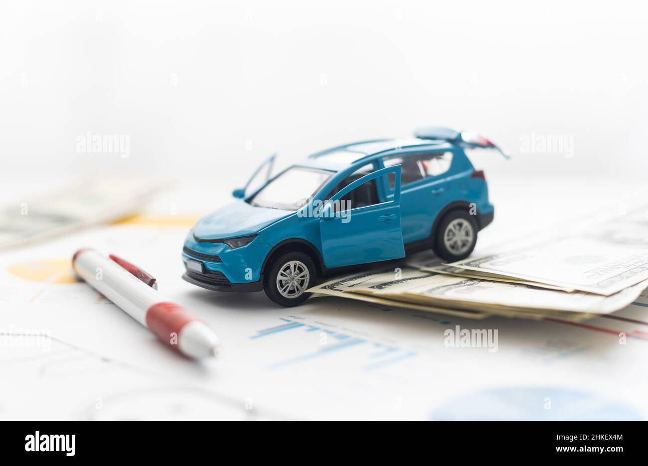 small car model and blueprint sheets Stock Photo - Alamy