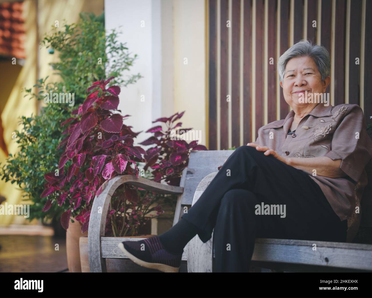 old elderly senior elder woman relaxing on terrace. mature retirement ...