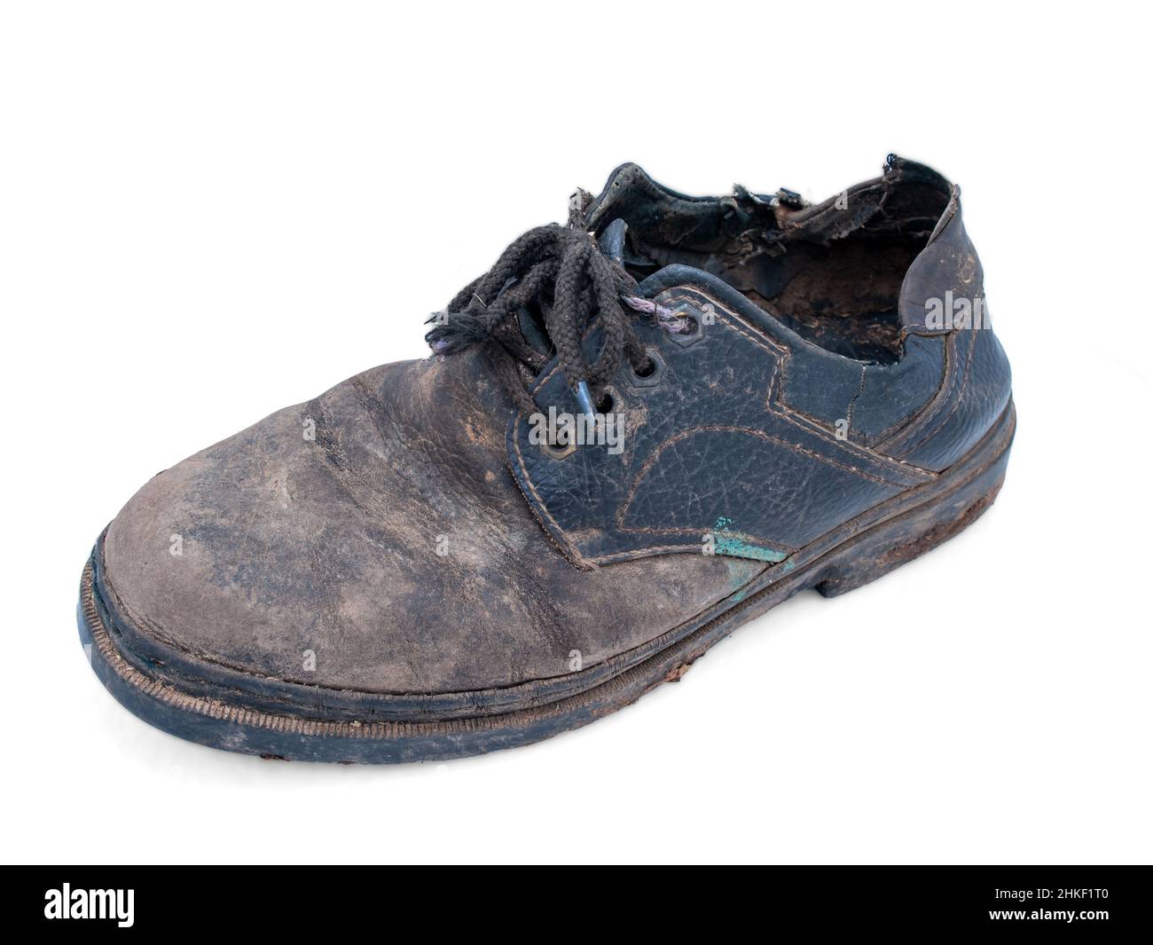 old worn shoe isolated on white background Stock Photo - Alamy