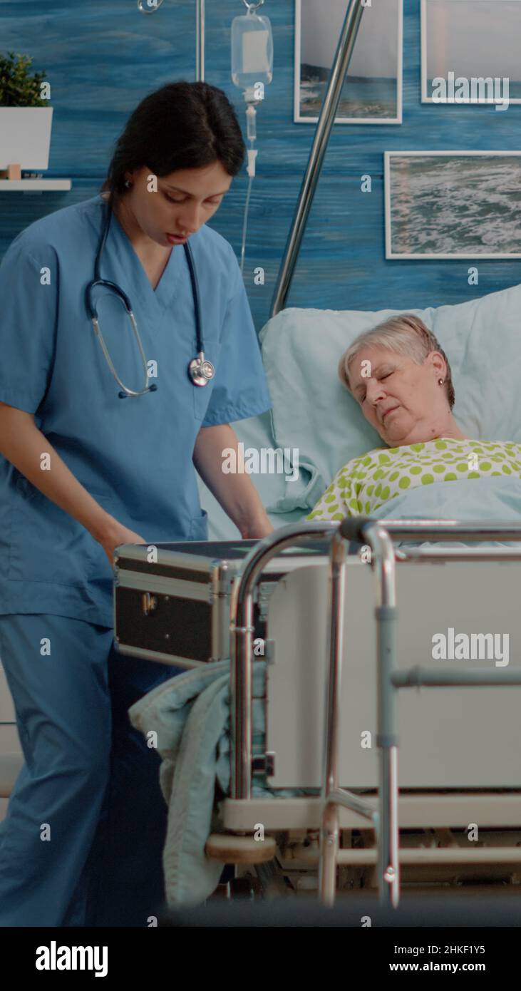 Elder man asking for help from doctor and nurse, giving medical ...