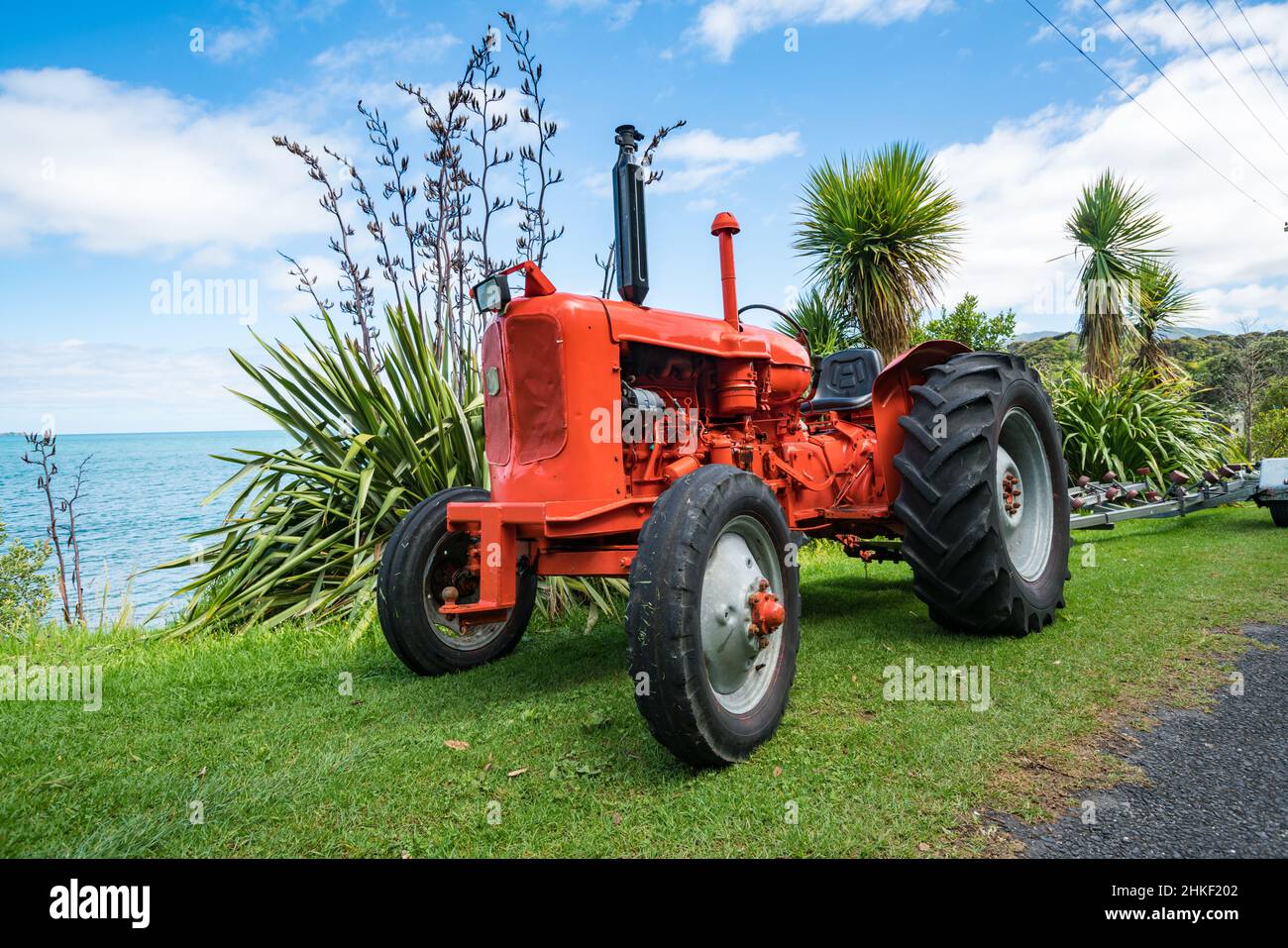 Small red tractor hi-res stock photography and images - Alamy