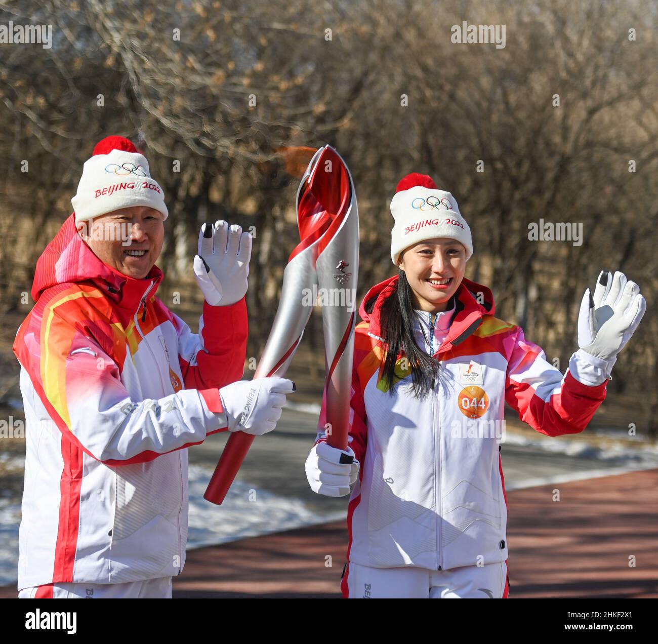 Beijing, China. 4th Feb, 2022. Torch bearers Ban Ki-moon (L) and Zhang ...