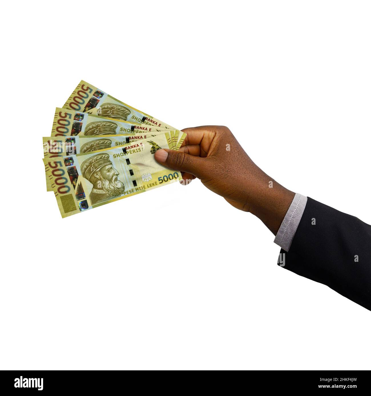 Black hand with suit holding 3D rendered 5000 Albanian lek notes ...