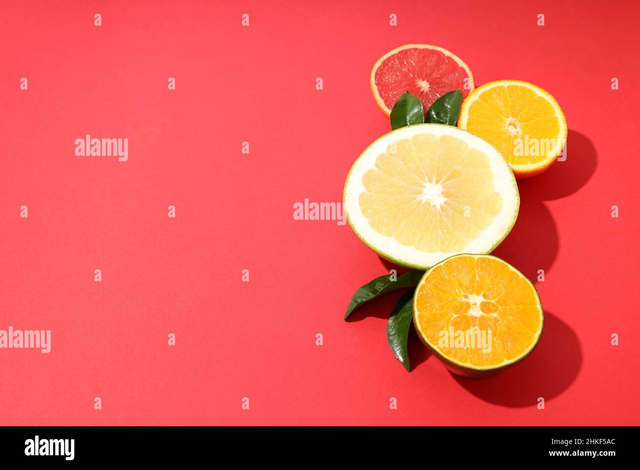 Citrus fruits on red hi-res stock photography and images - Alamy