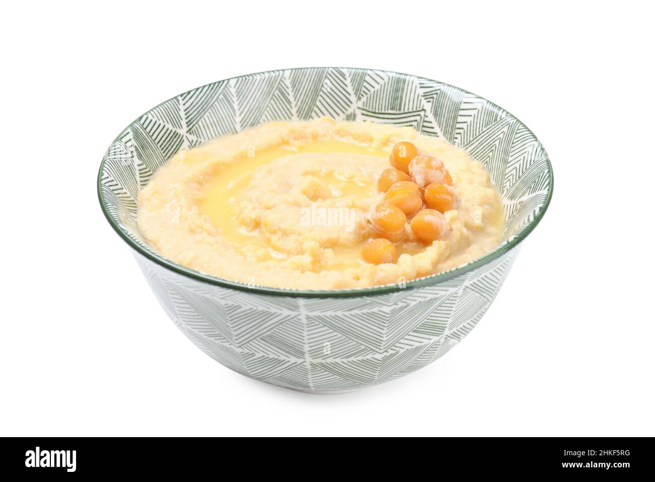Plate of hummus isolated on white background Stock Photo - Alamy