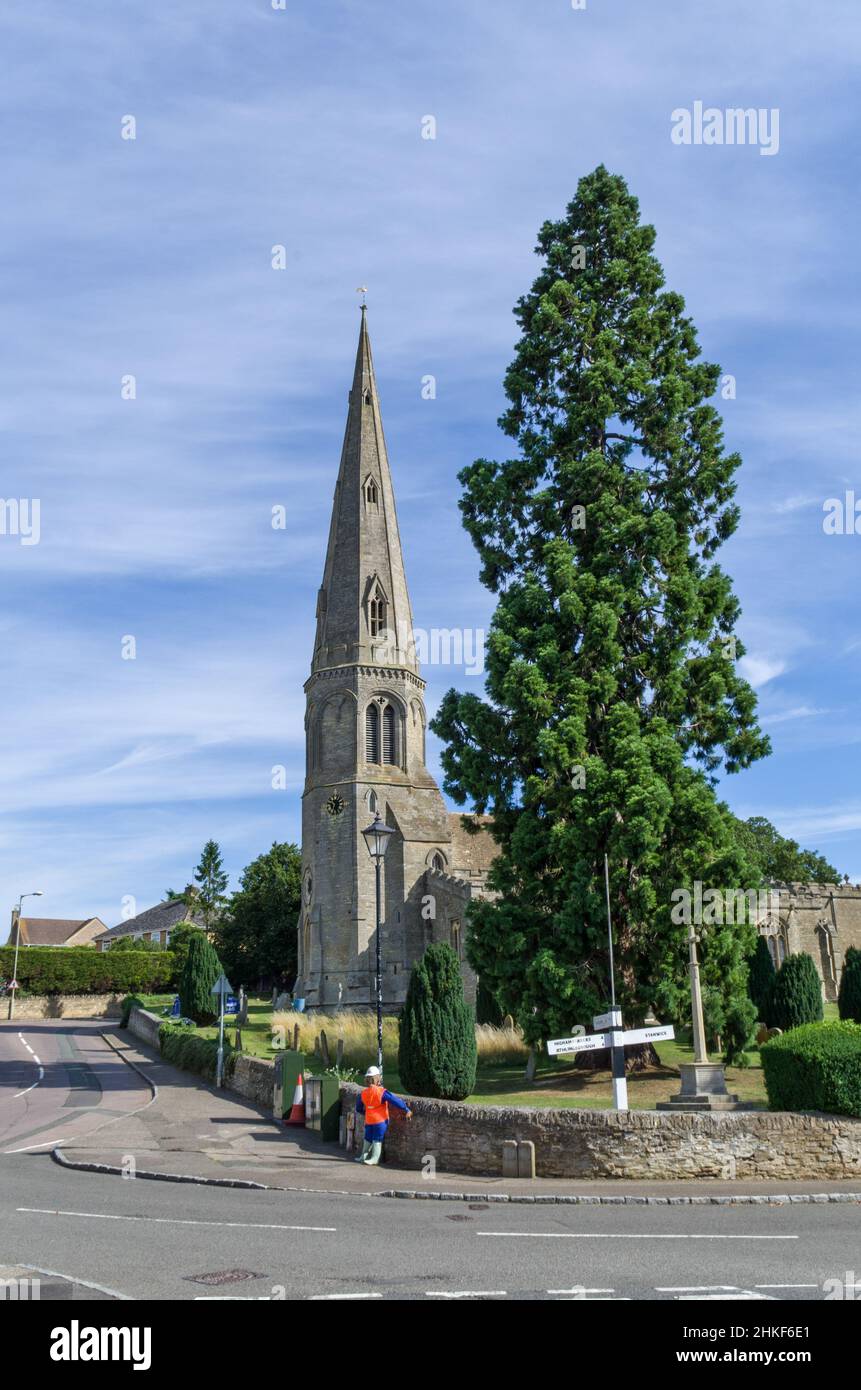 Summer street scene in the village of Stanwick, Northamptonshire, UK ...
