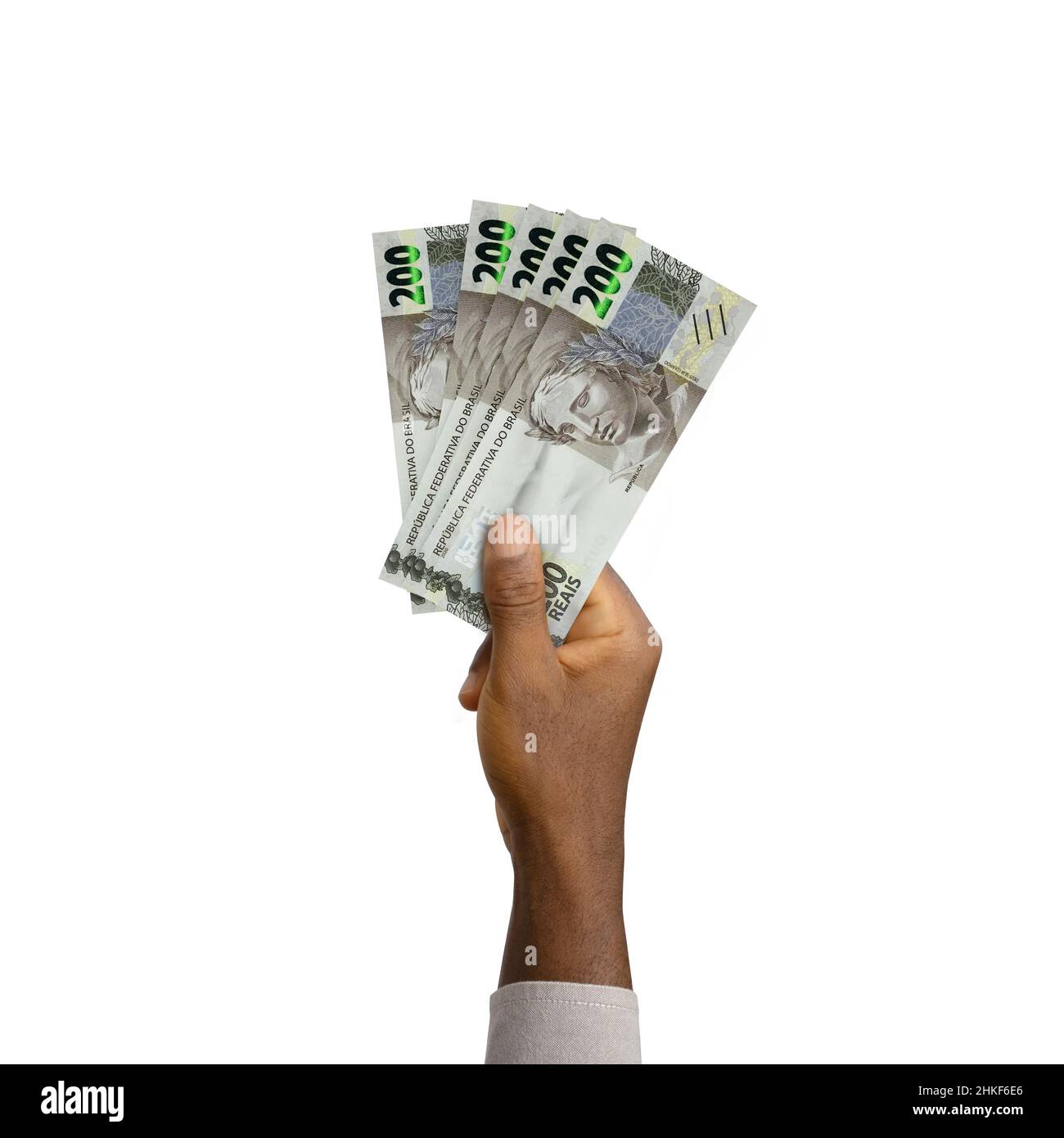 Black Hand holding 3D rendered 200 Brazilian reais notes isolated on ...