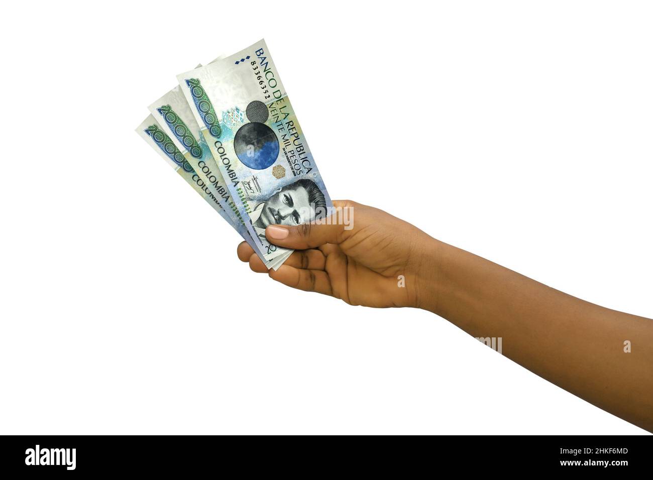 Fair hand holding 3D rendered 20000 Colombian peso notes isolated on ...