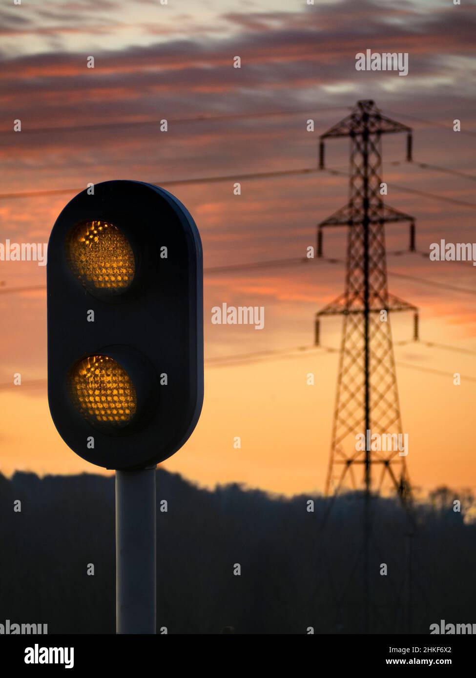 Railway signal and pylon in Radley, winter sunrise 5 Stock Photo - Alamy