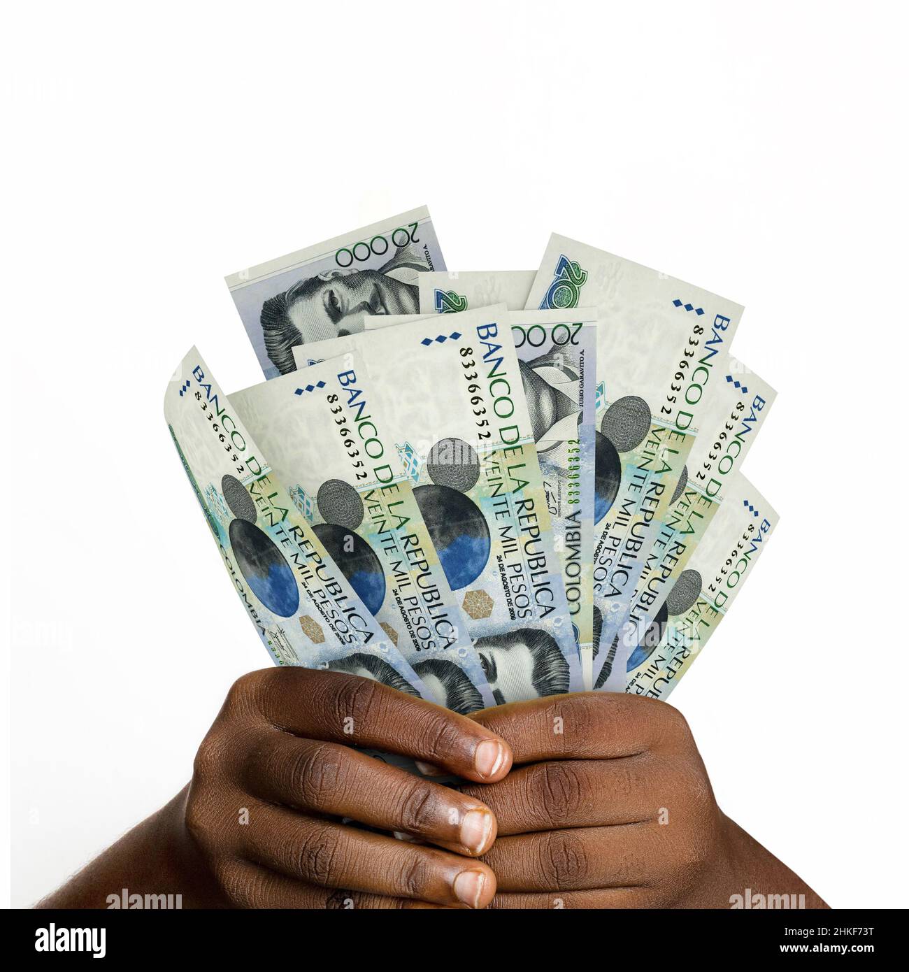 Black hands holding 3D rendered 20000 Colombian peso notes. closeup of ...