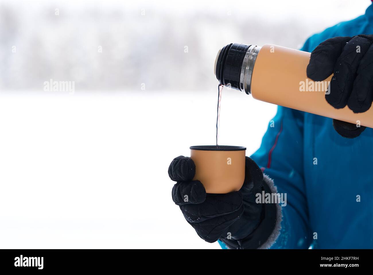 Pouring hot water from a flask hi-res stock photography and images - Alamy