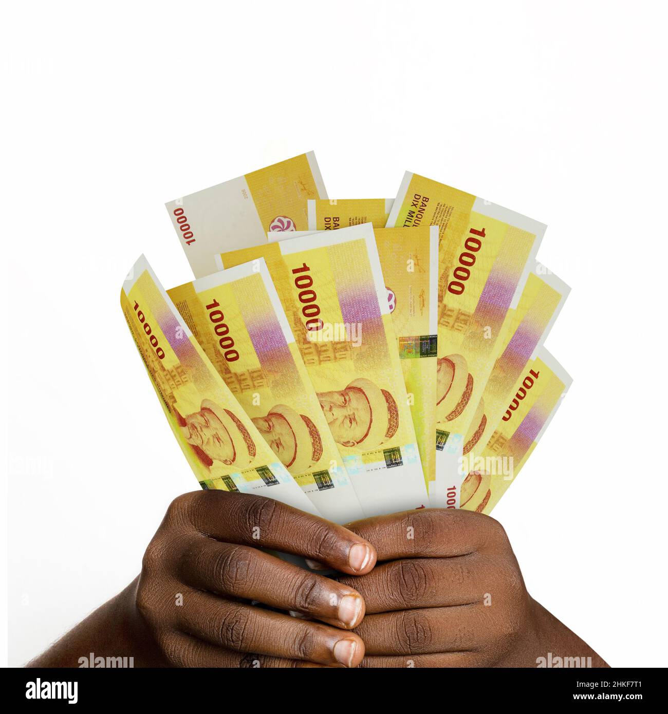 hands holding 3D rendered Comorian franc notes. closeup of Hands ...