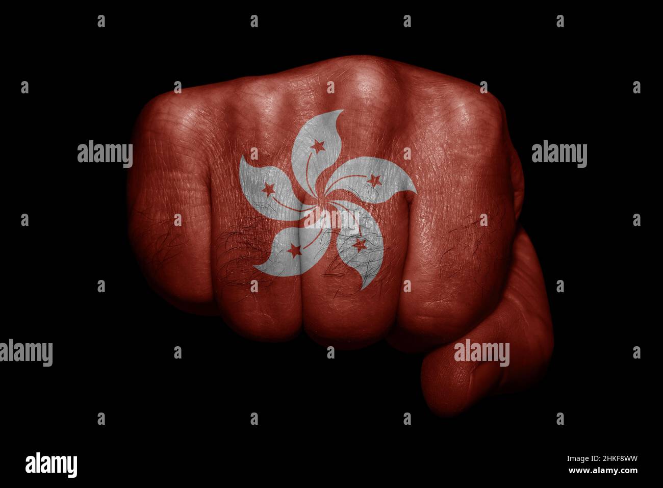 Flag of Hong Kong painted on strong fist on black background Stock ...
