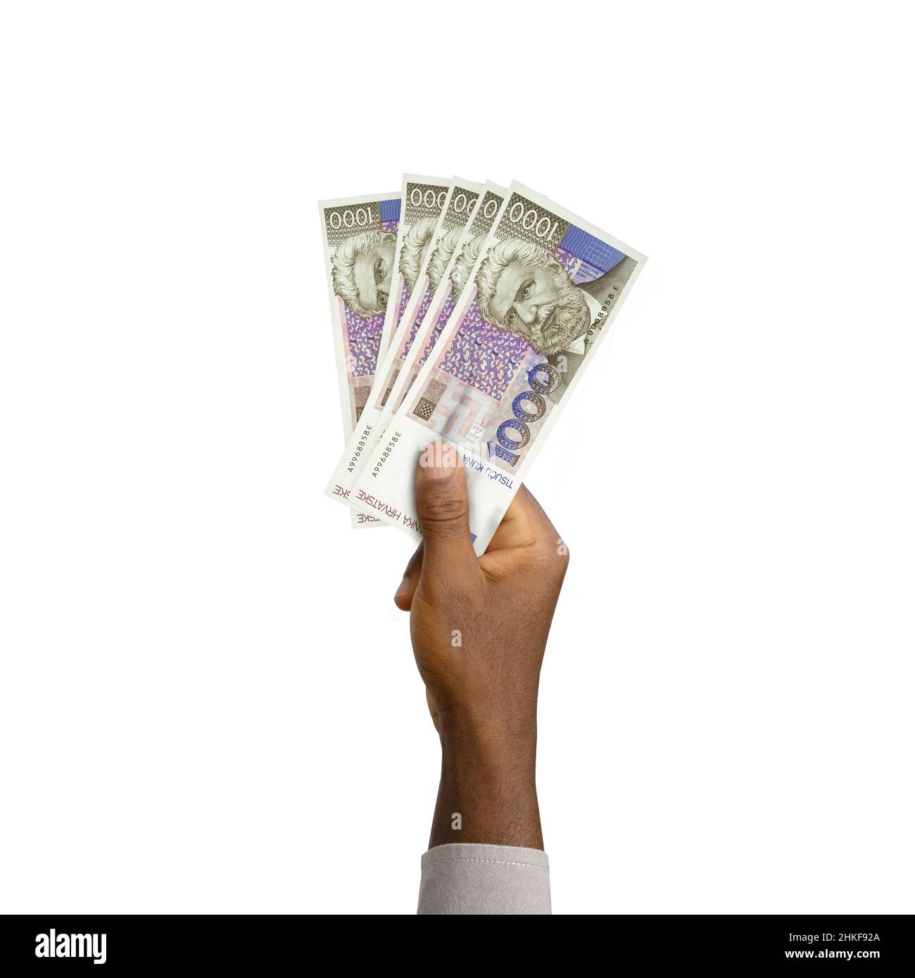 Black Hand holding 3D rendered Croatia 1000 Kuna notes isolated on ...