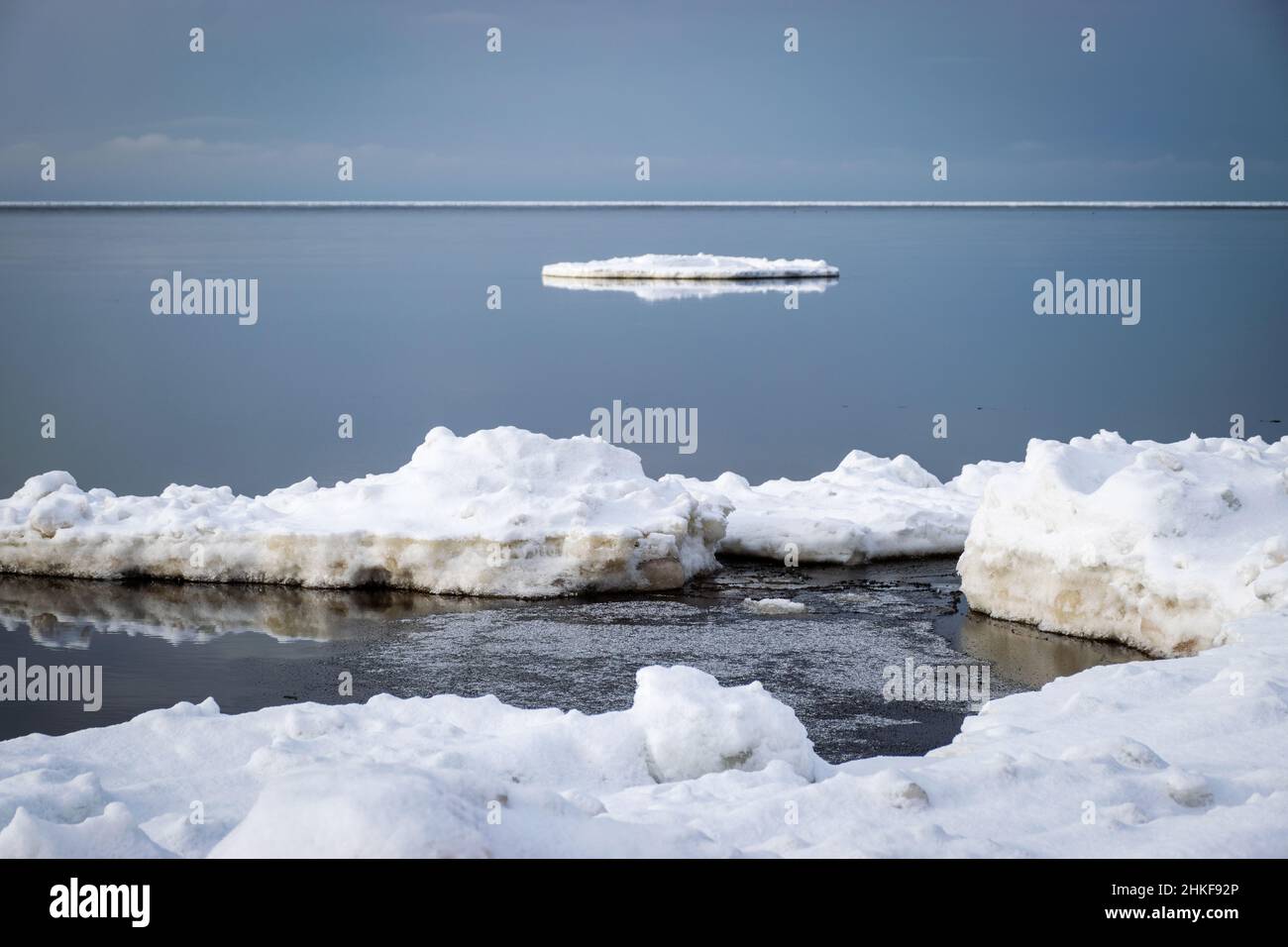 white pieces of ice floating in the sea, winter landscape from the sea ...