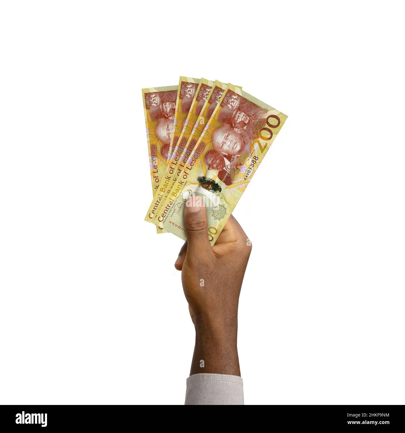 Black Hand holding 3D rendered 200 Lesothan loti notes isolated on ...