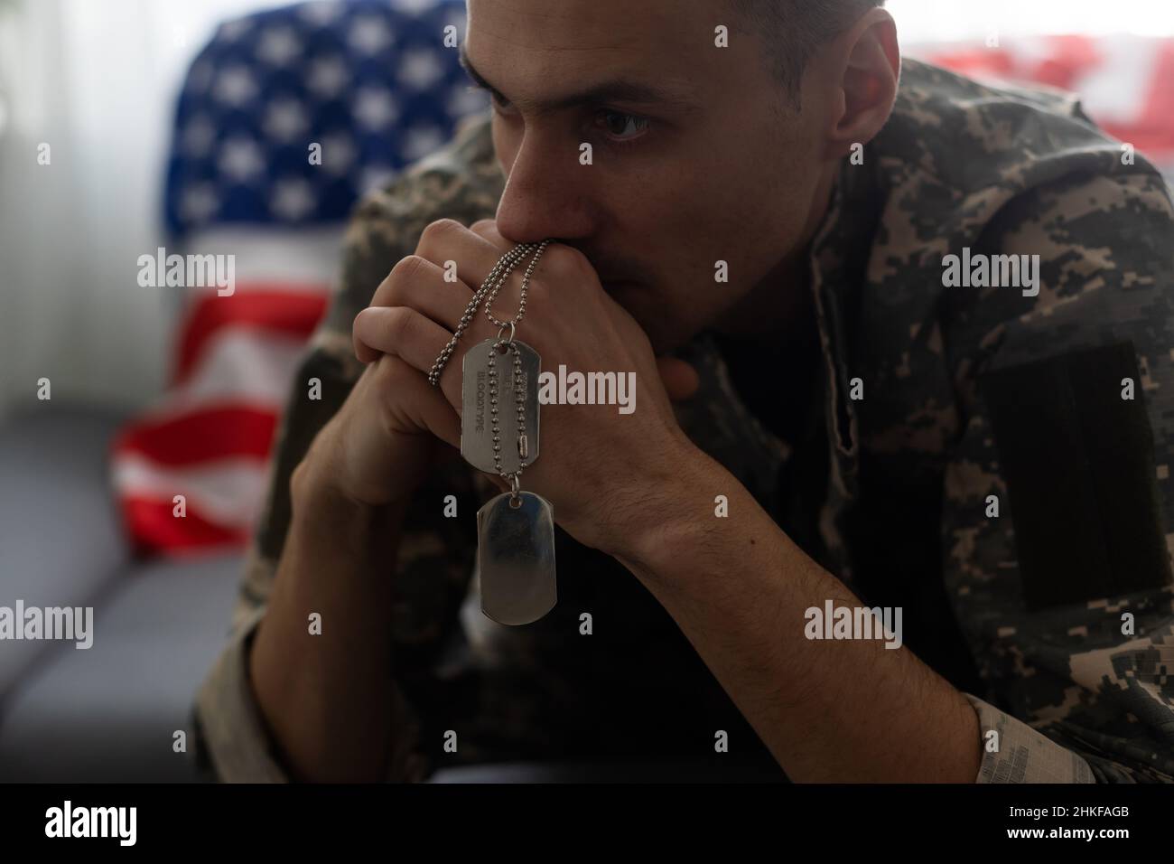 man in military uniform crying USA flag background Stock Photo - Alamy