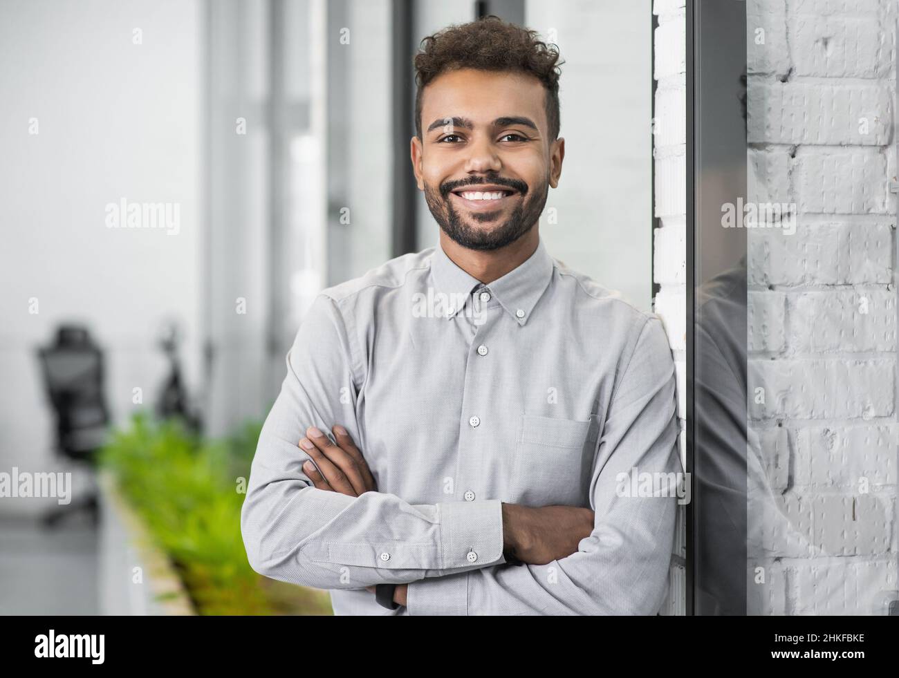 Handsome young businessman portrait. Cheerful self confident smiling ...