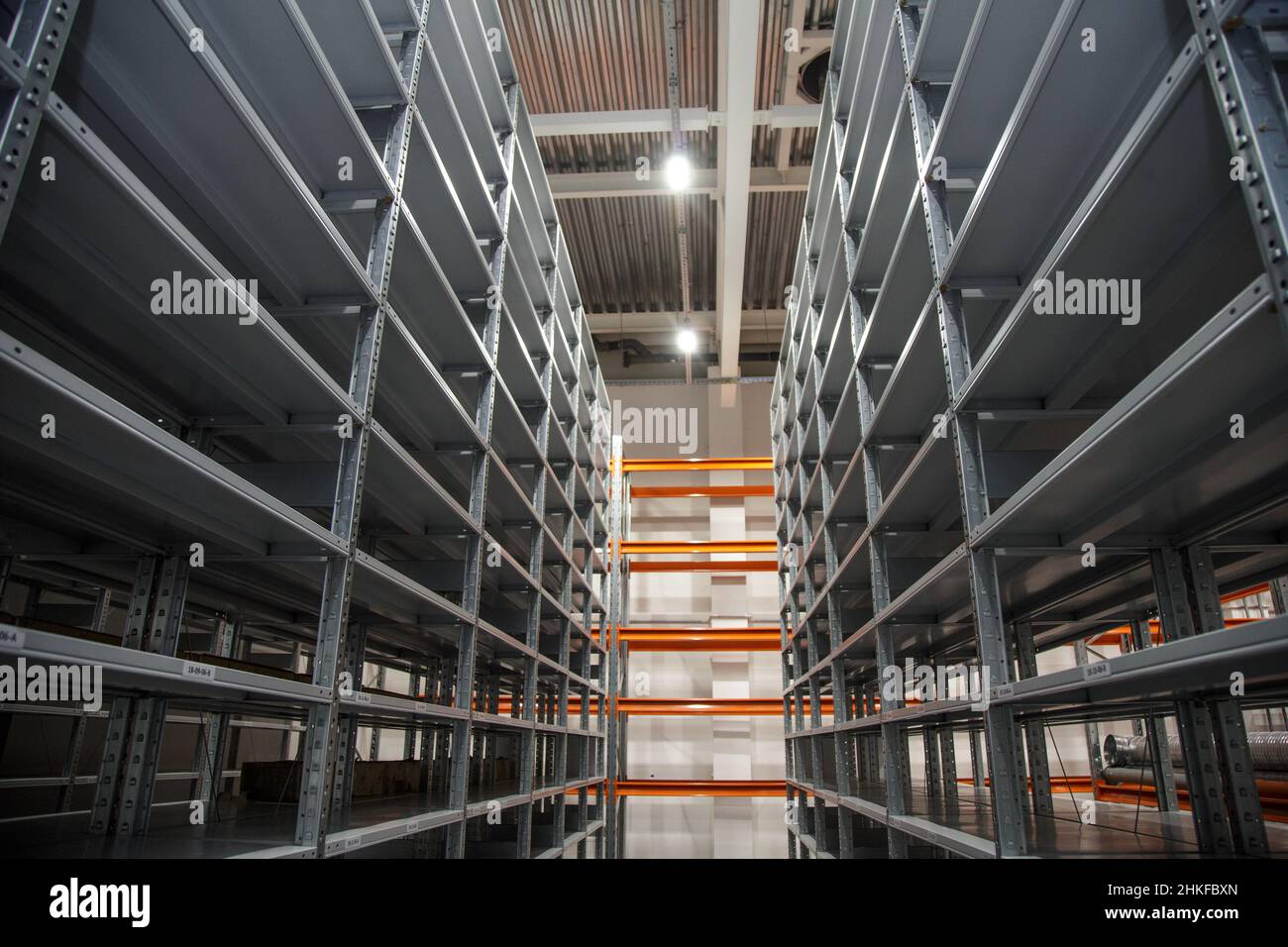 empty shelves of a large warehouse Stock Photo - Alamy