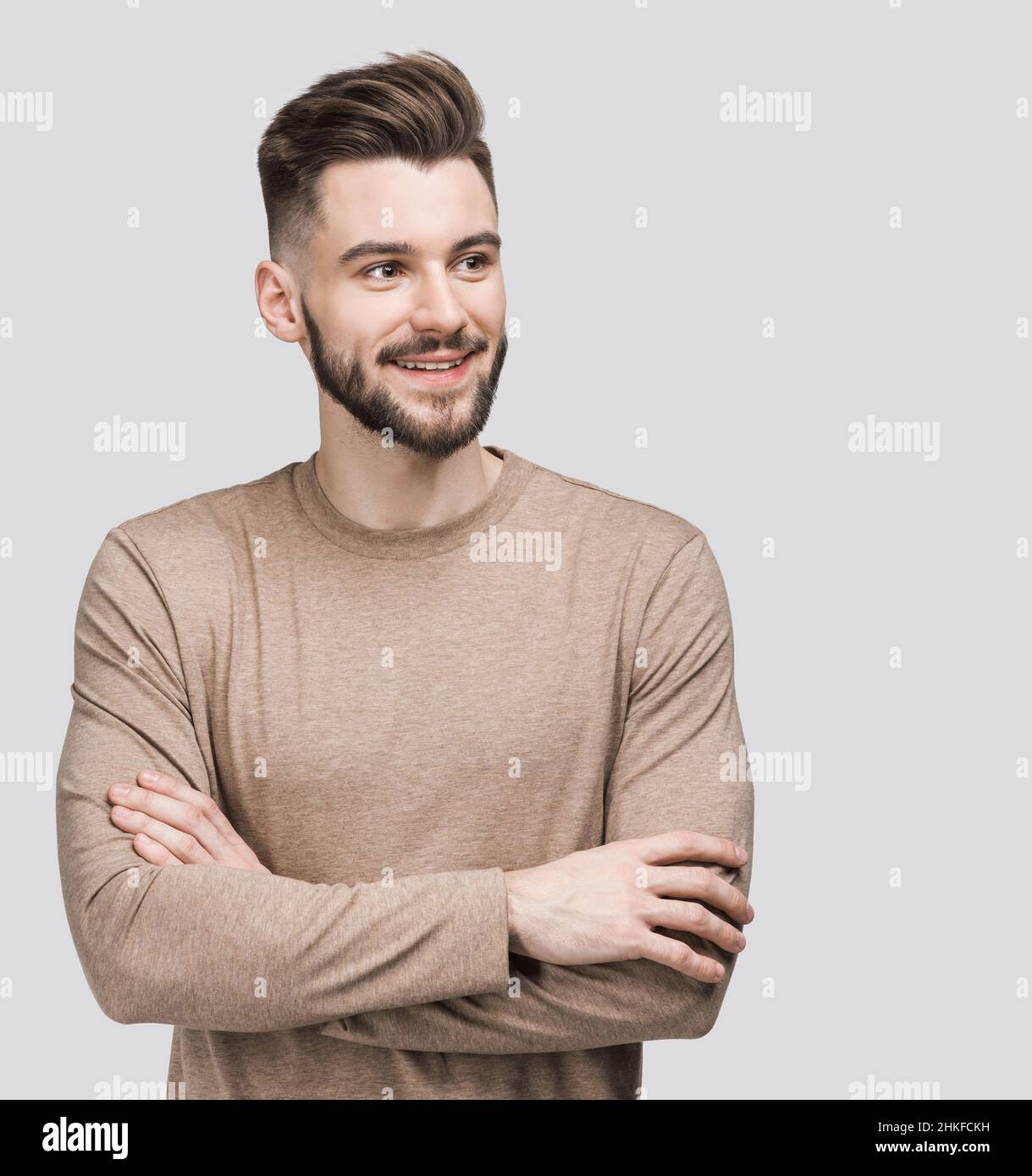 Smiling young man studio portrait isolated. Joyful handsome men with ...