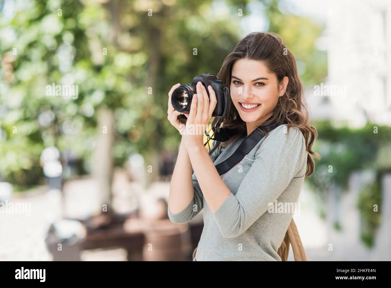 Woman Professional Photographer With Dslr Camera Outdoors Portrait