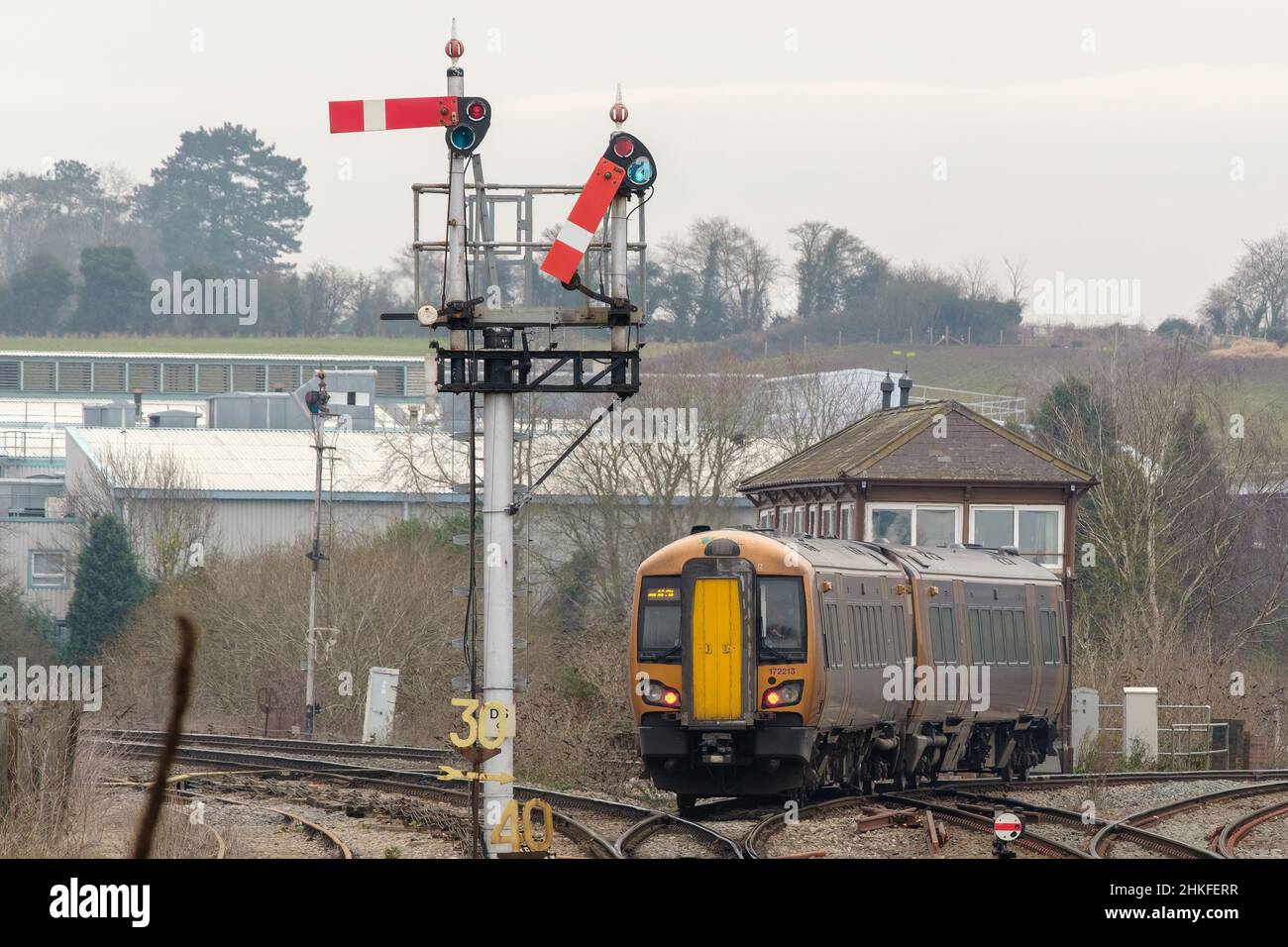 Lower quadrant railway signal showing clear for the diesel train ...