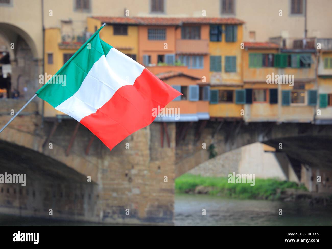 Italyische flag before the Ponte Vecchio about Arno, Florence, Firenze ...