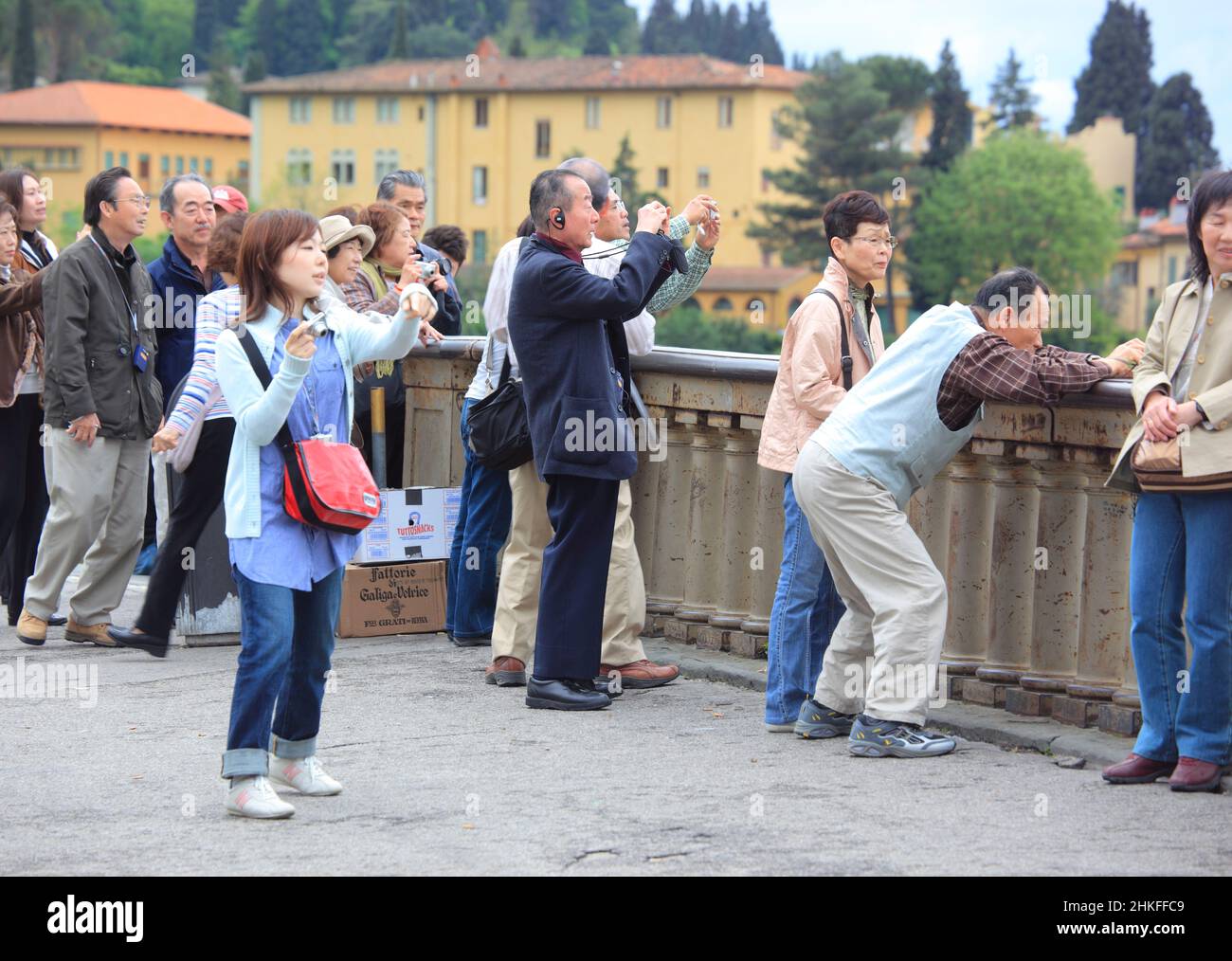 Japanese tourists at the Piazza Michelangelo overlooking the city ...