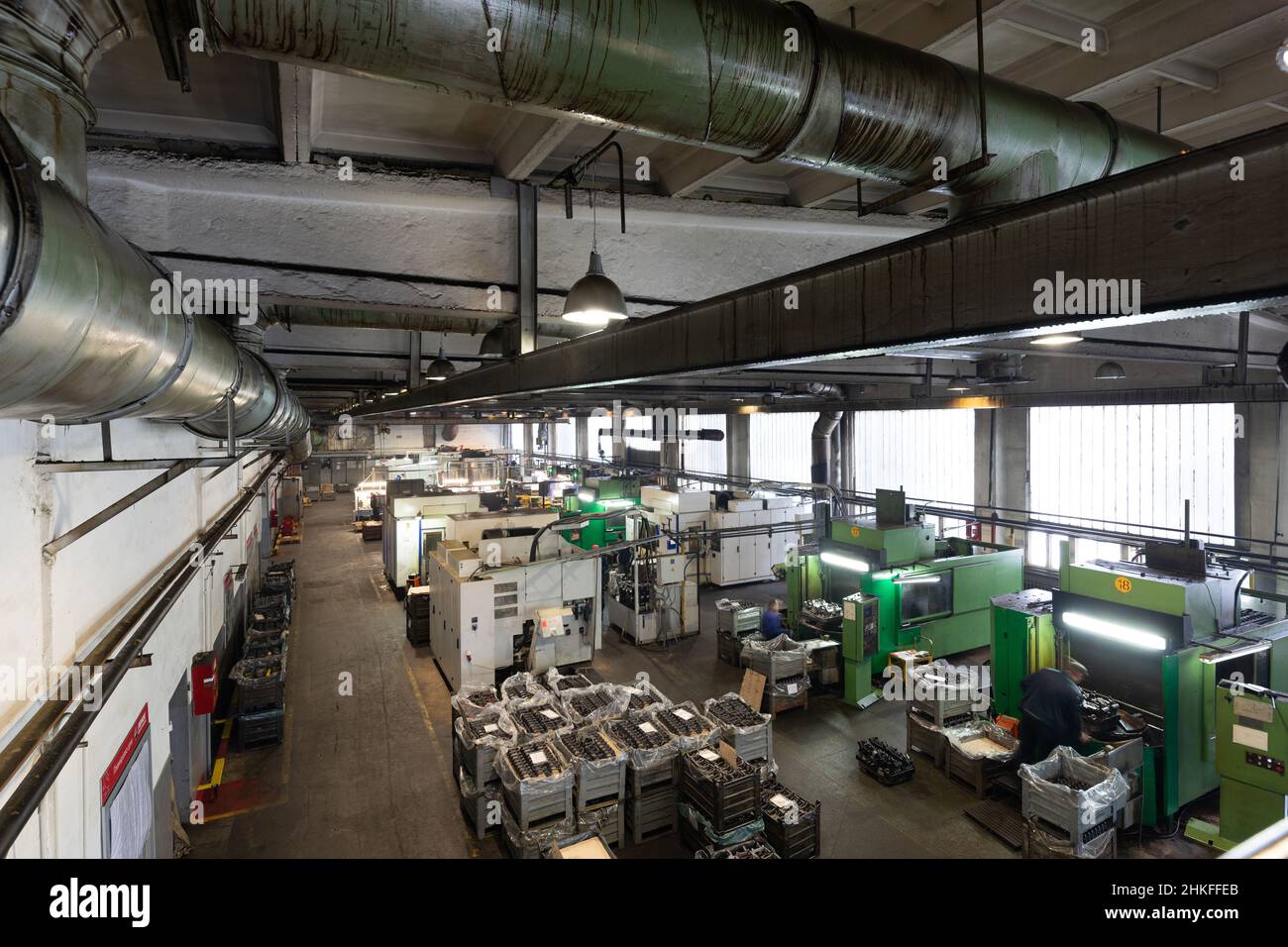 The interior of a big industrial building of factory with steel ...