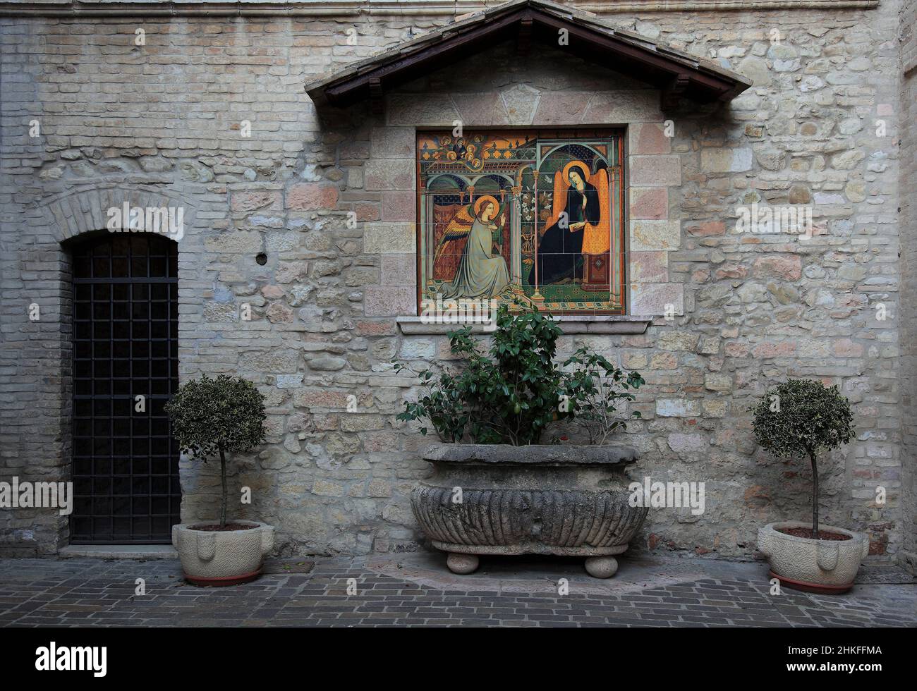 Holy picture in a house in the Old Town of Assisi, Umbria, Italy Stock ...