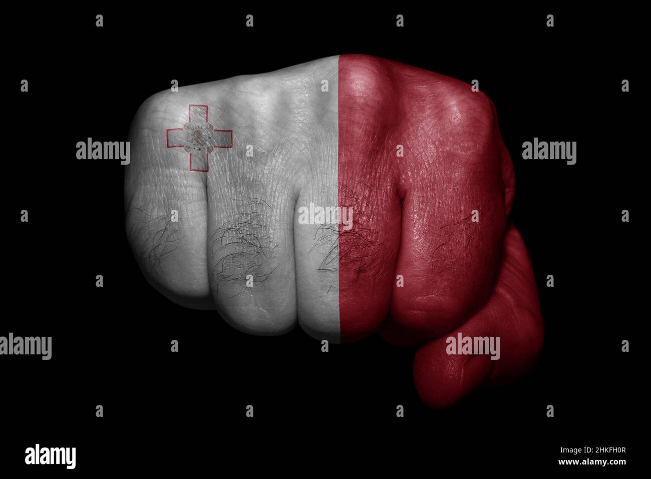 Flag of Malta painted on strong fist on black background Stock Photo ...