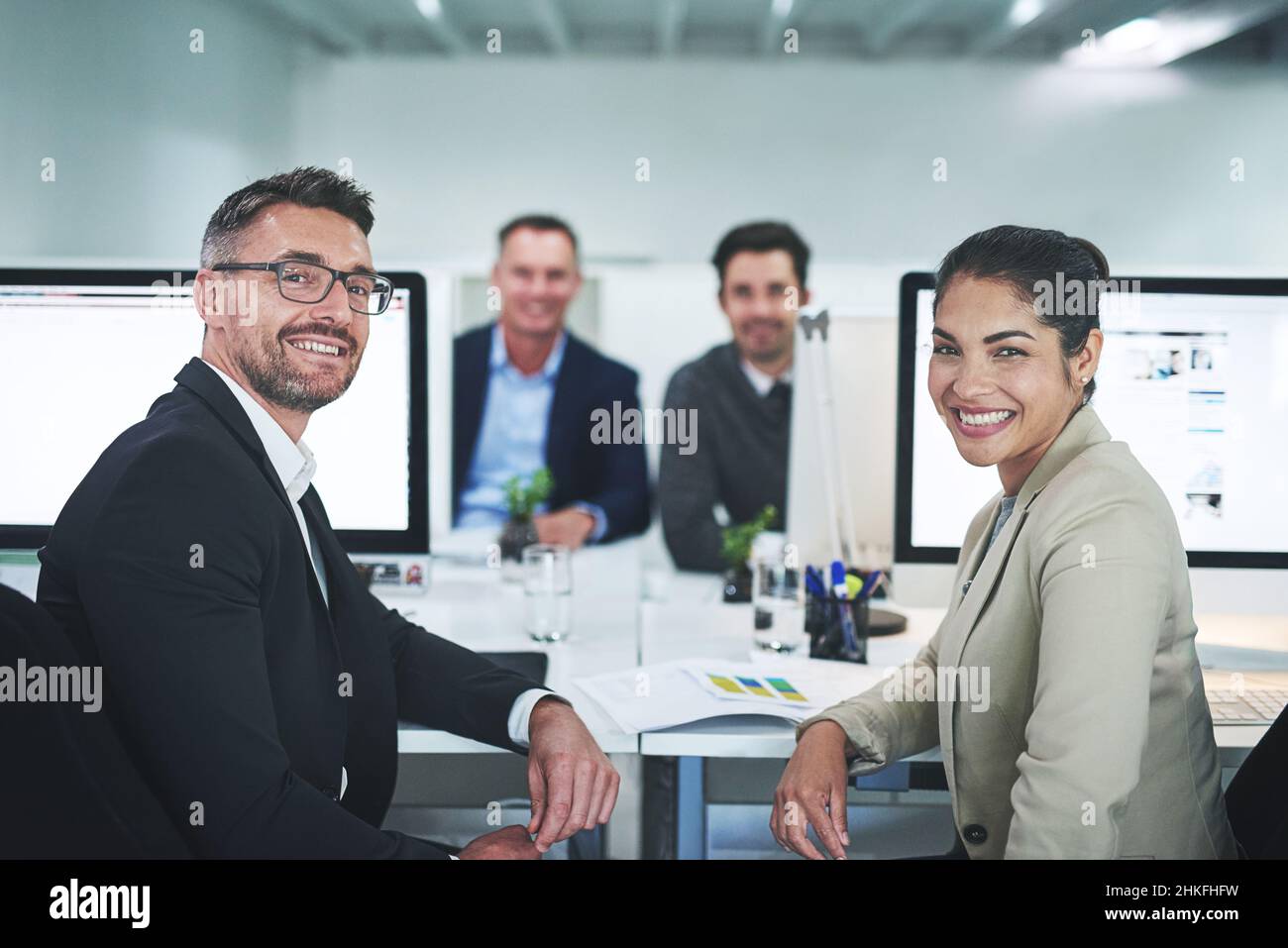 Success is the product of teamwork. Shot of corporate colleagues ...