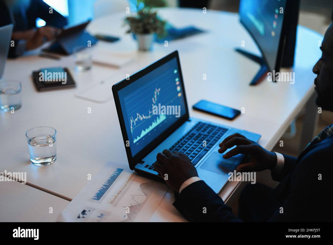 Business trader team doing blockchain analysis inside hedge fund office ...