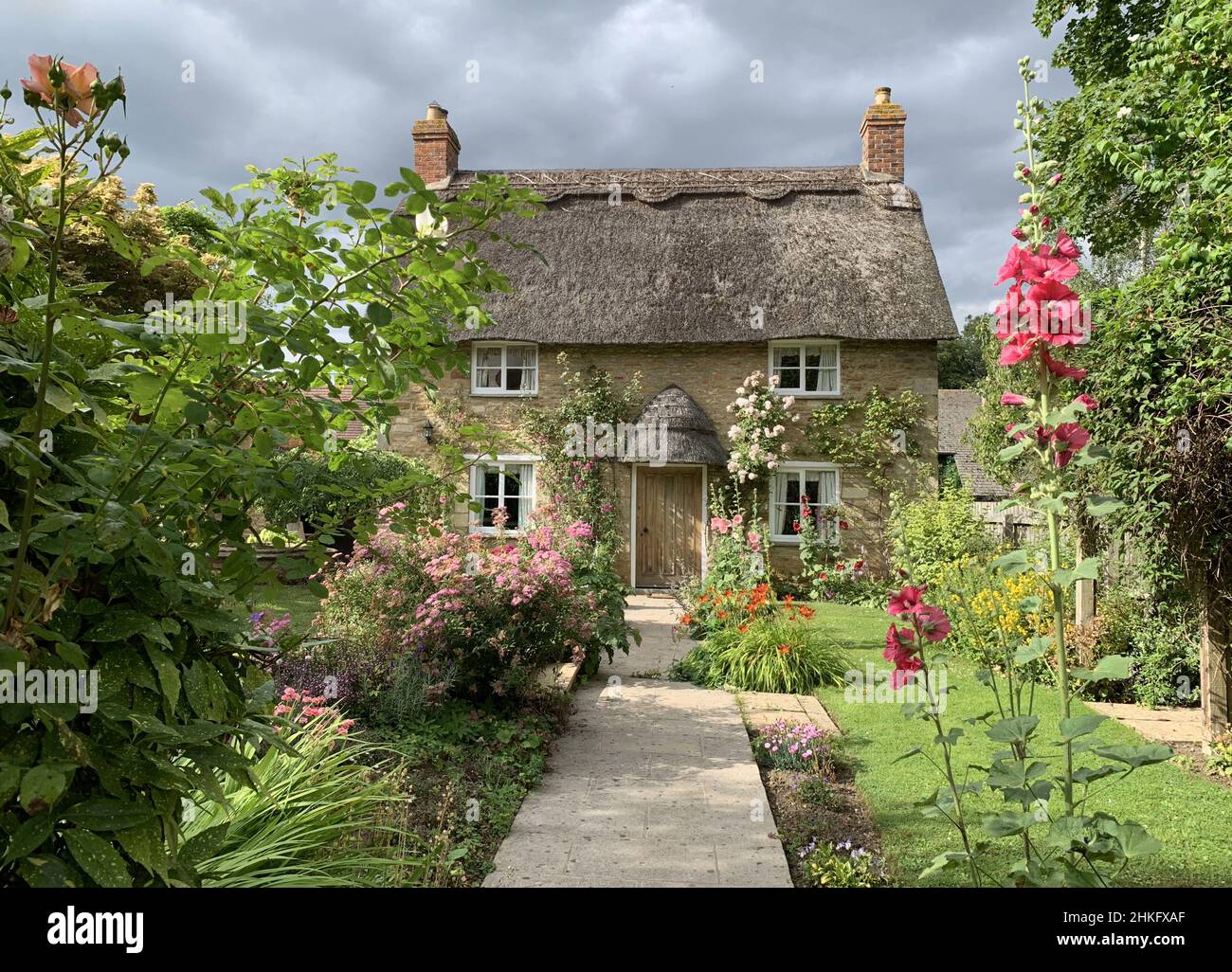 A gorgeous thatched cottage and garden in a rural English village on a ...