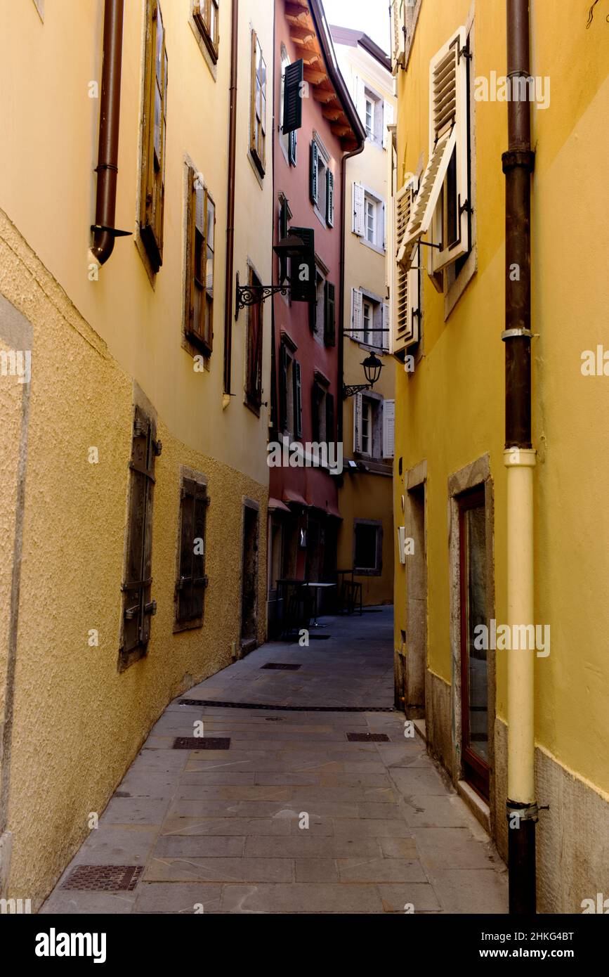 Narrow color street in Trieste, Italy - colorful houses in a row Stock ...