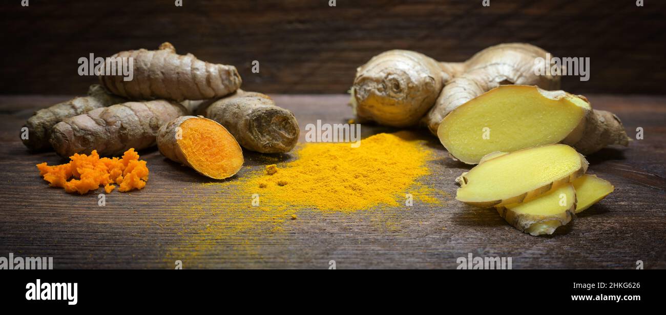Turmeric and ginger, two Asian spicy roots with healthy effects, dark ...