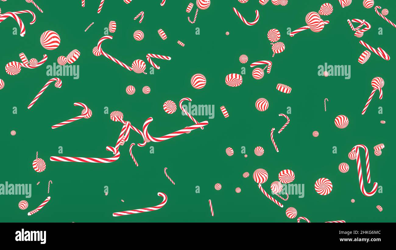 3D Render. Peppermint candy canes falling down slowly on green ...