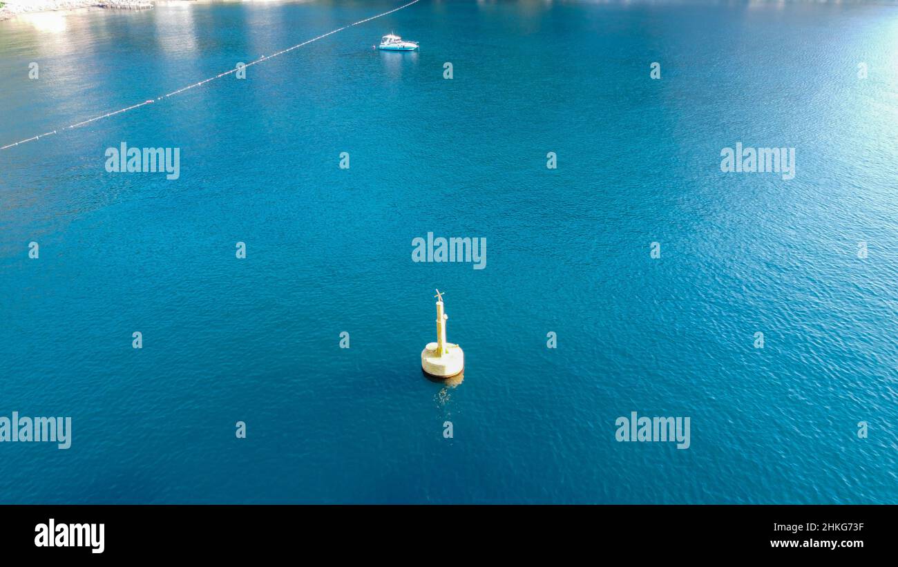 Aerial view of Yellow Sea Buoy in turquoise water of Mediterranean Sea ...