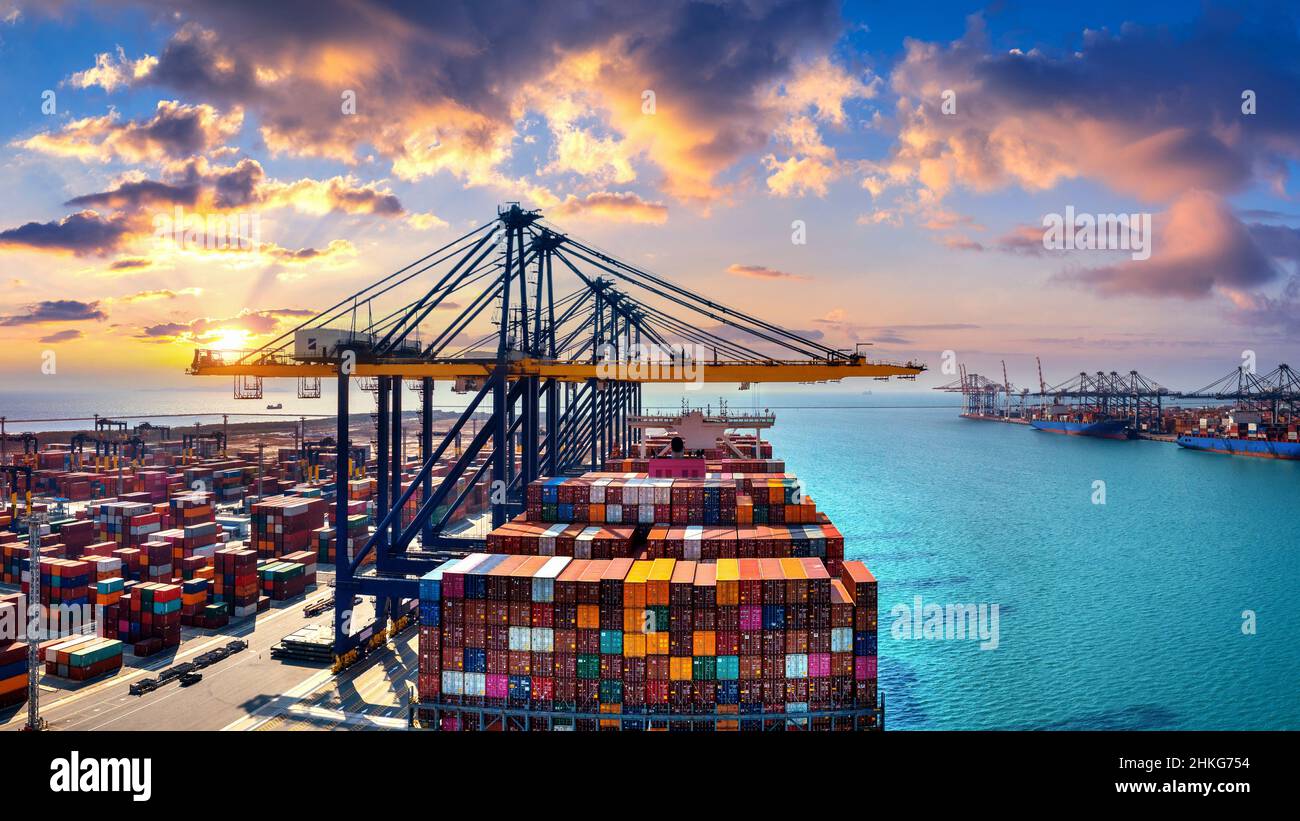 Aerial view of cargo ship and cargo container in harbor Stock Photo - Alamy
