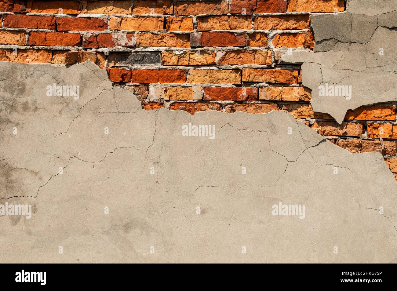 Old brick wall with fallen off plaster. Background of crack brick wall ...