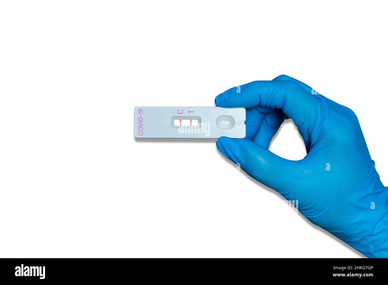 Hand holding Rapid Antigen Test kit(ATK) with Positive result during ...