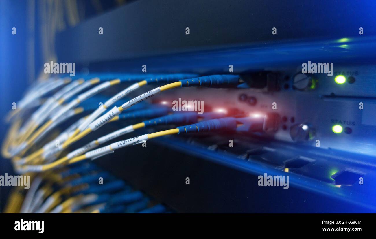 Close up fiber optic and hub in datacenter Stock Photo - Alamy