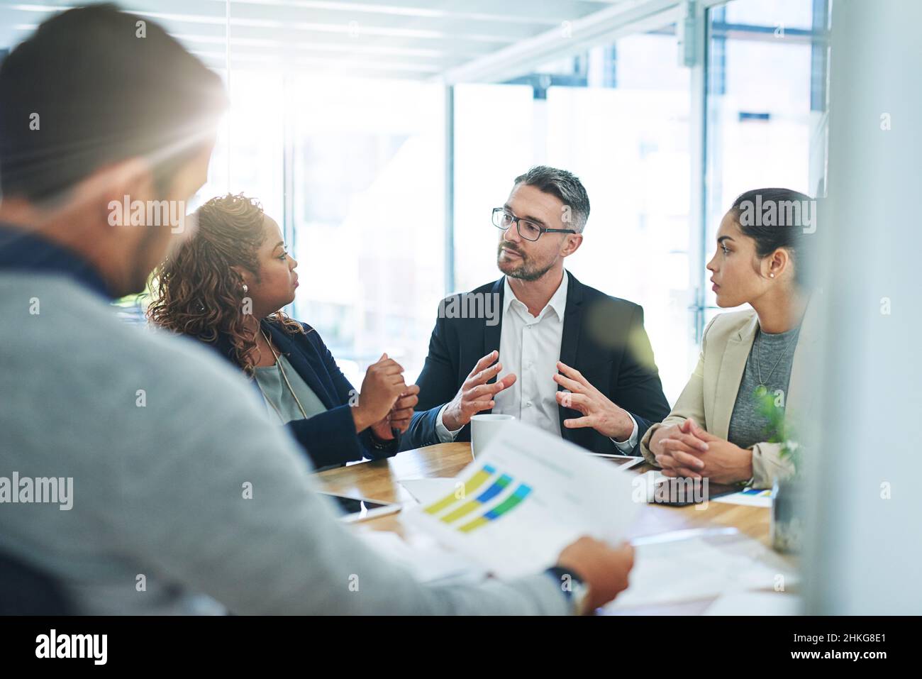 Success is the product of teamwork. Shot of corporate colleagues ...