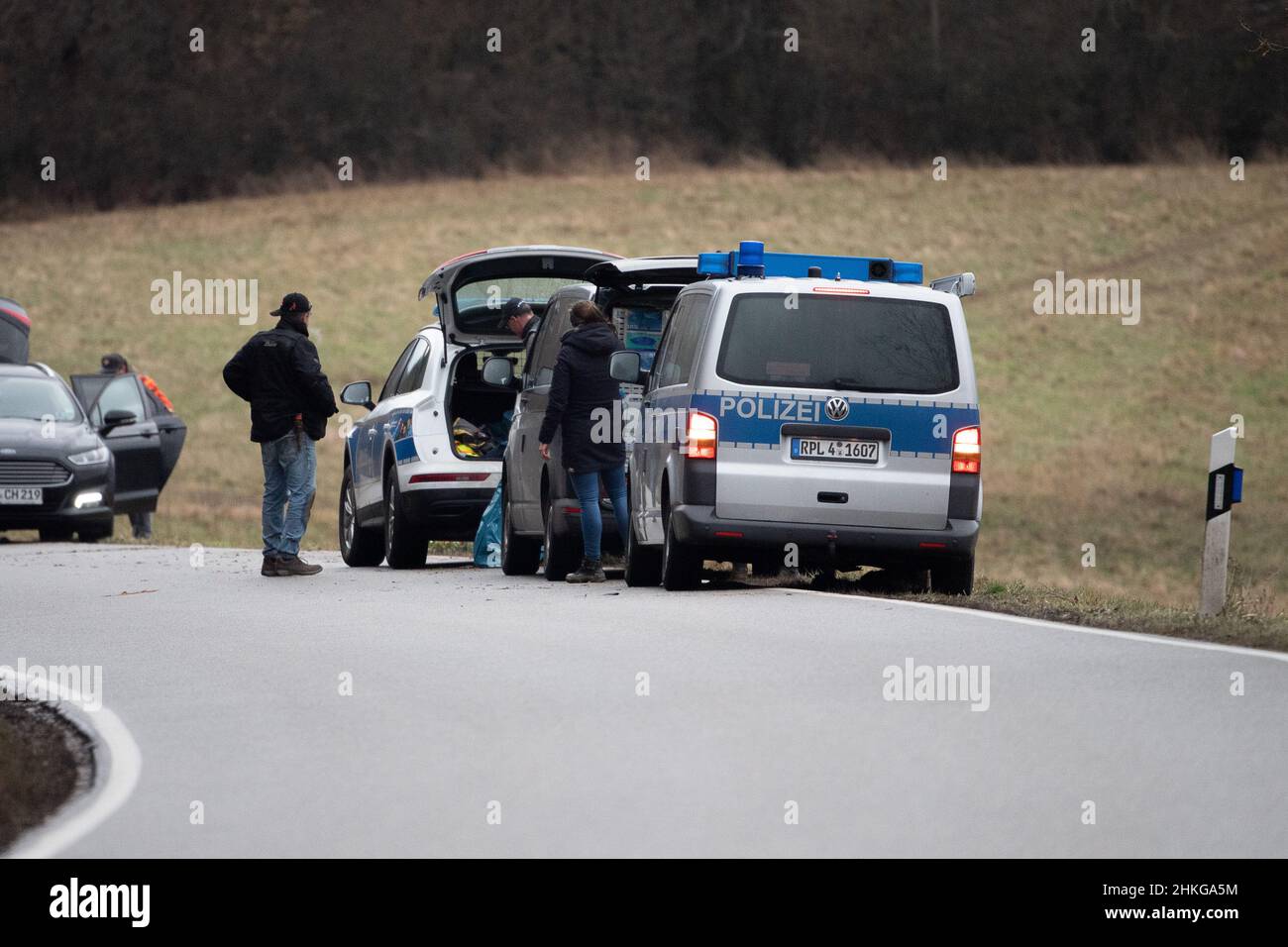 Ulmet, Germany. 04th Feb, 2022. Police cars and officers stand at the ...