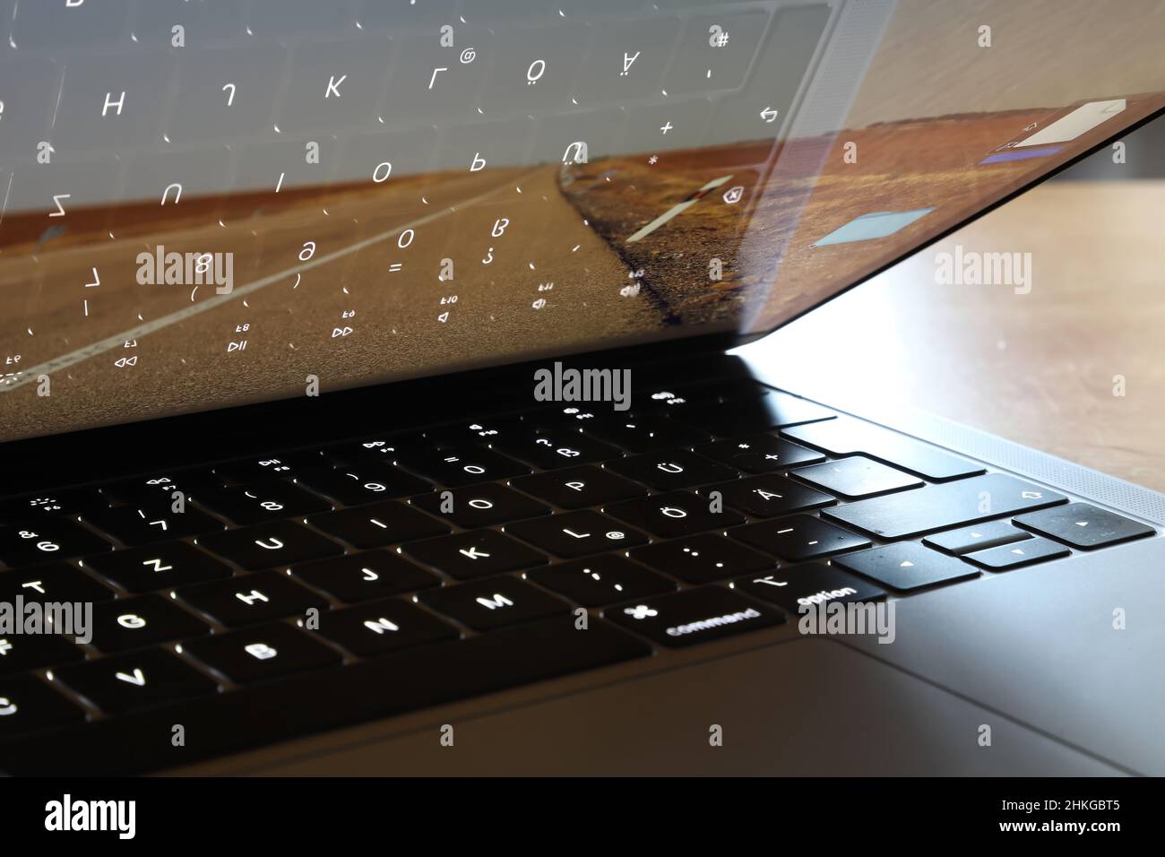 Laptop on desk Stock Photo - Alamy