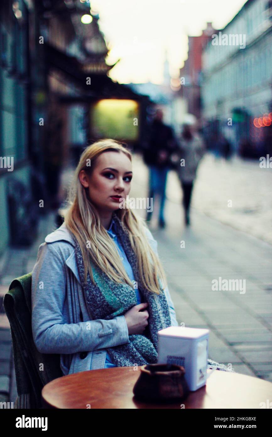 Sitting modelling pose hi-res stock photography and images - Alamy